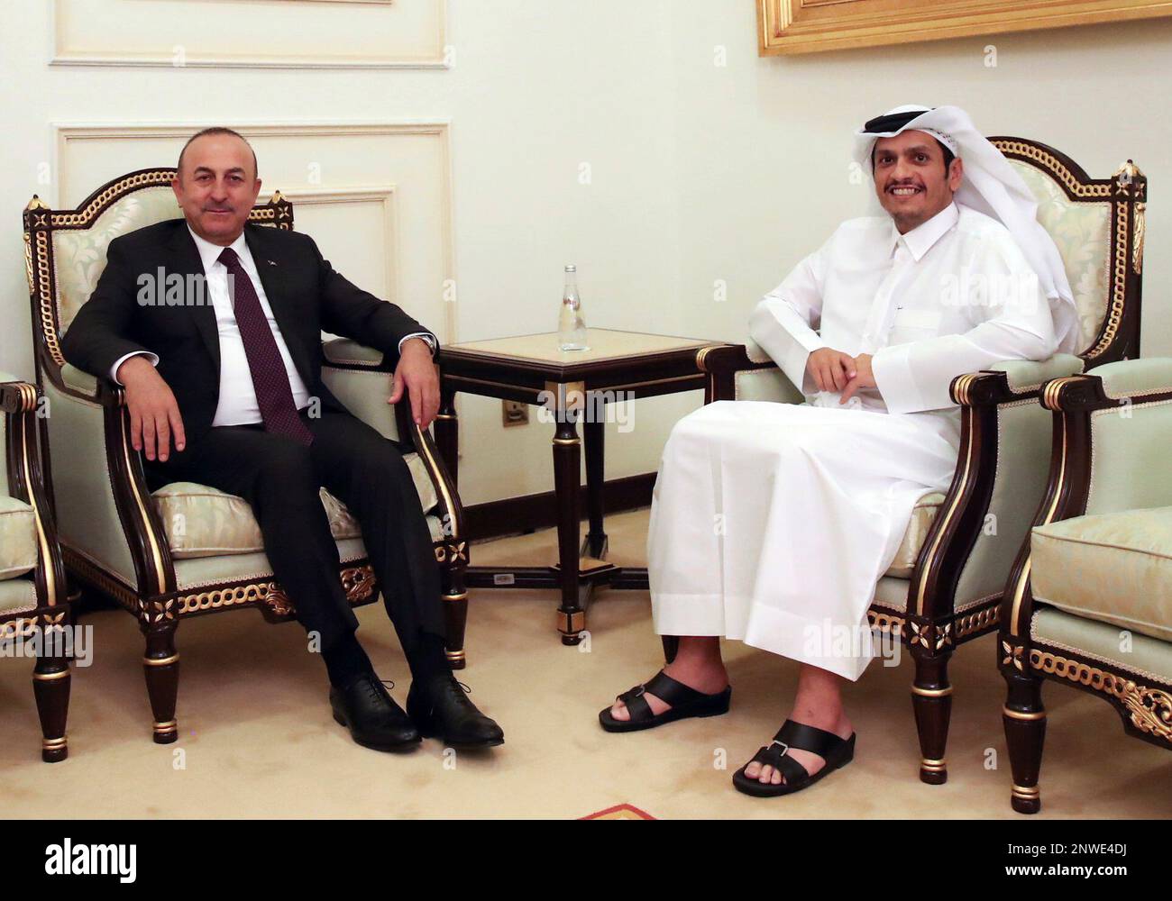 Turkish Foreign Minister Mevlut Cavusoglu, left, and Qatar's Foreign ...