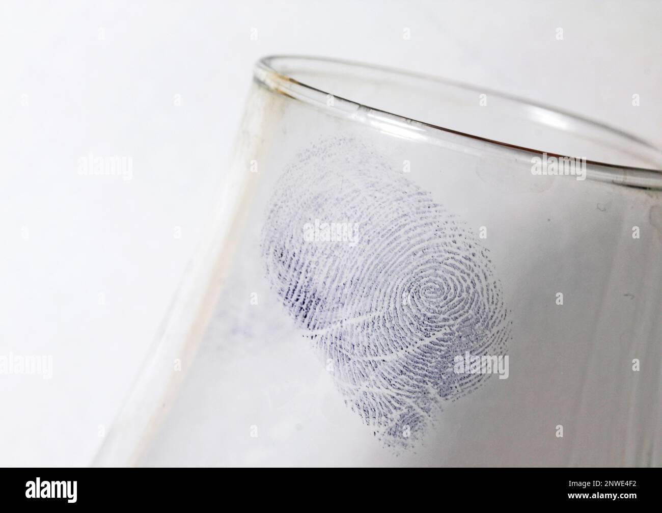 Finger print on a glass tumbler Stock Photo - Alamy
