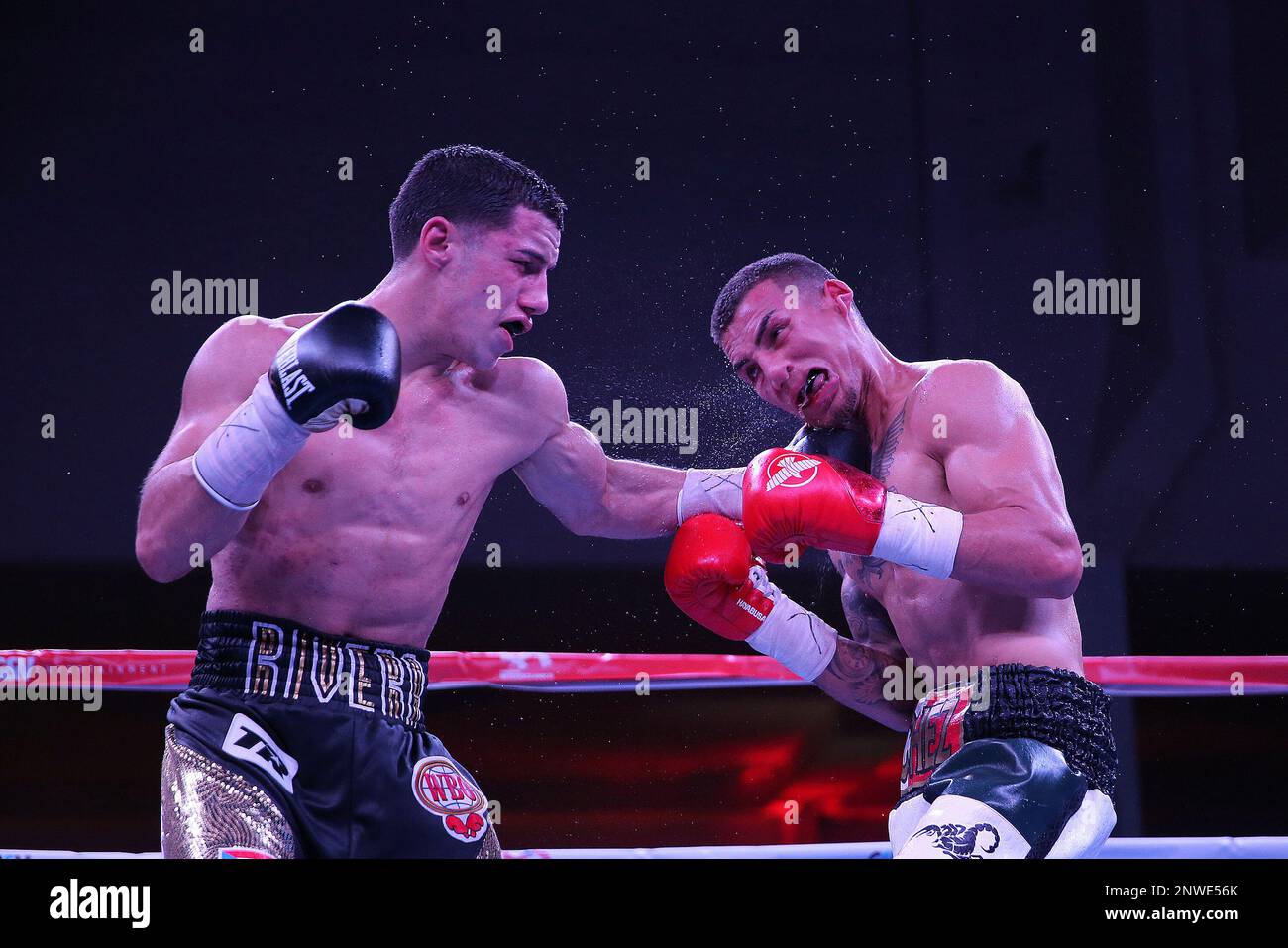 Jean Carlos "Chapito" Rivera punches Jason Sanchez during their ...