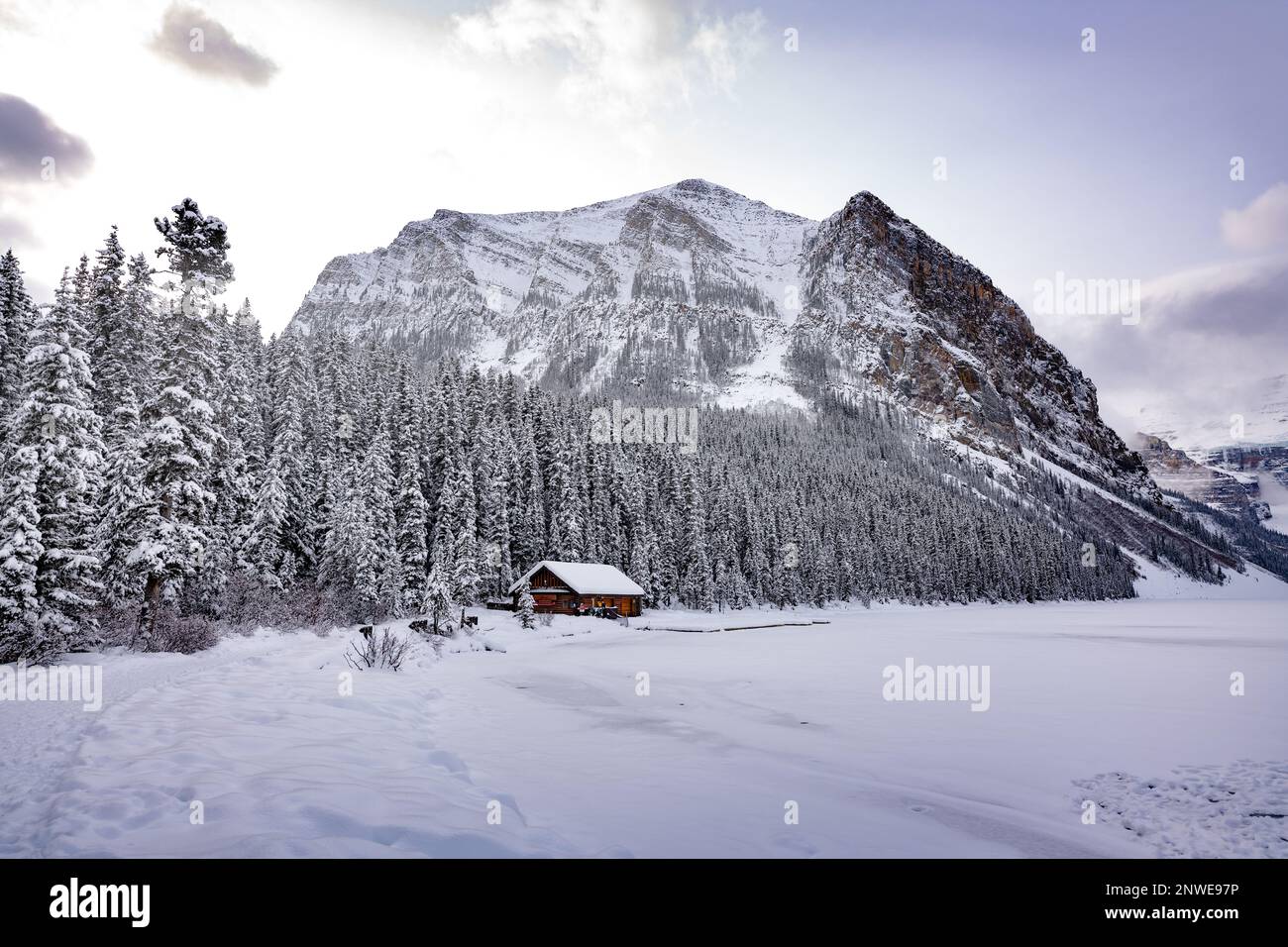 Iconic Lake Louise in Banff National Park during winter time with fully ...