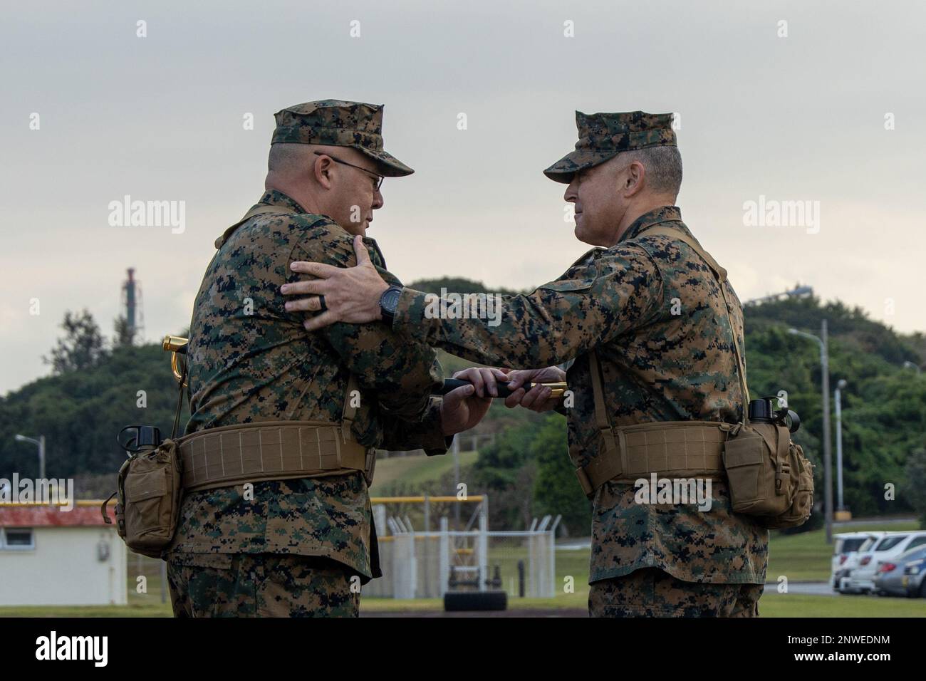 U.S. Marine Corps Brig. Gen. Adam Chalkley, right, commanding general ...