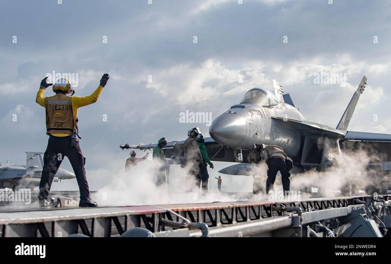 230211-N-MJ302-2210 SOUTH CHINA SEA (Feb.11, 2023) An F/A-18E Super ...