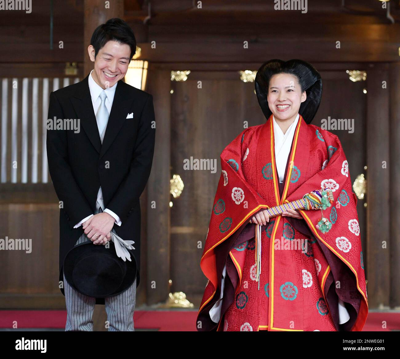 Japanese Princess Ayako, right, dressed in traditional ceremonial robe ...
