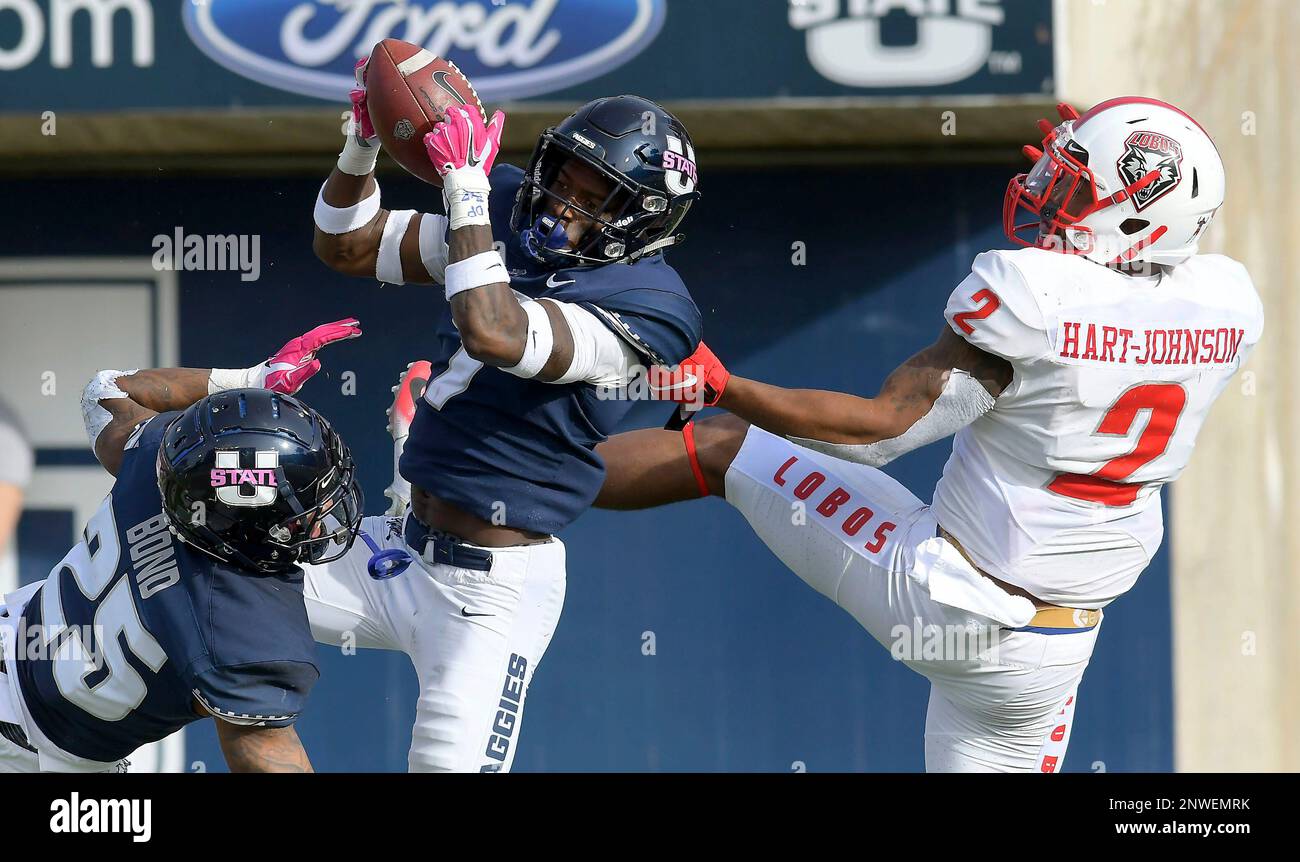 Utah State cornerback DJ Williams (7) intercepts a pass intended for ...