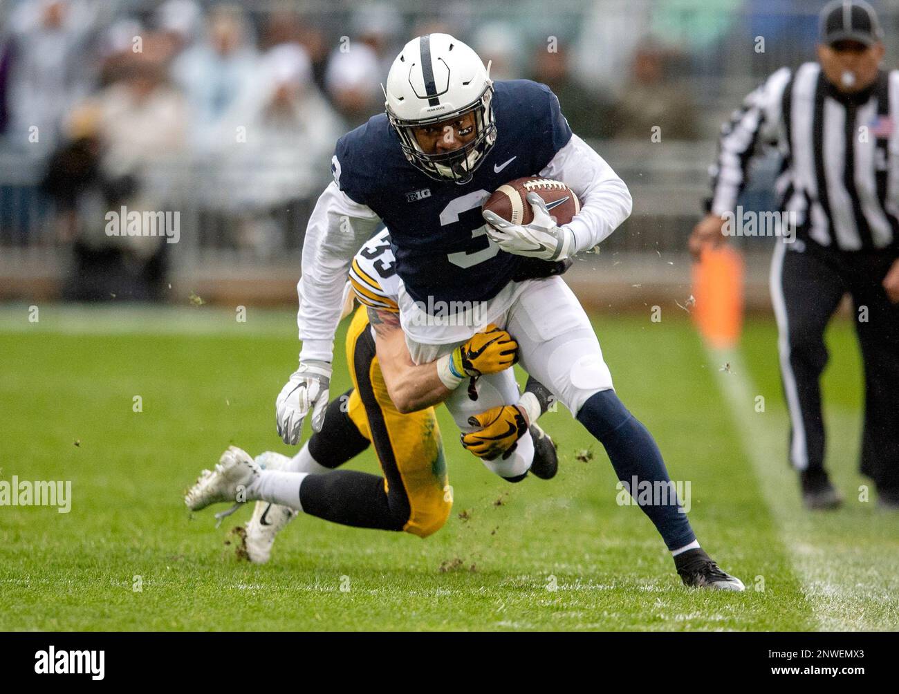 Iowa defensive back Riley Moss tries to stop Penn State wide receiver ...