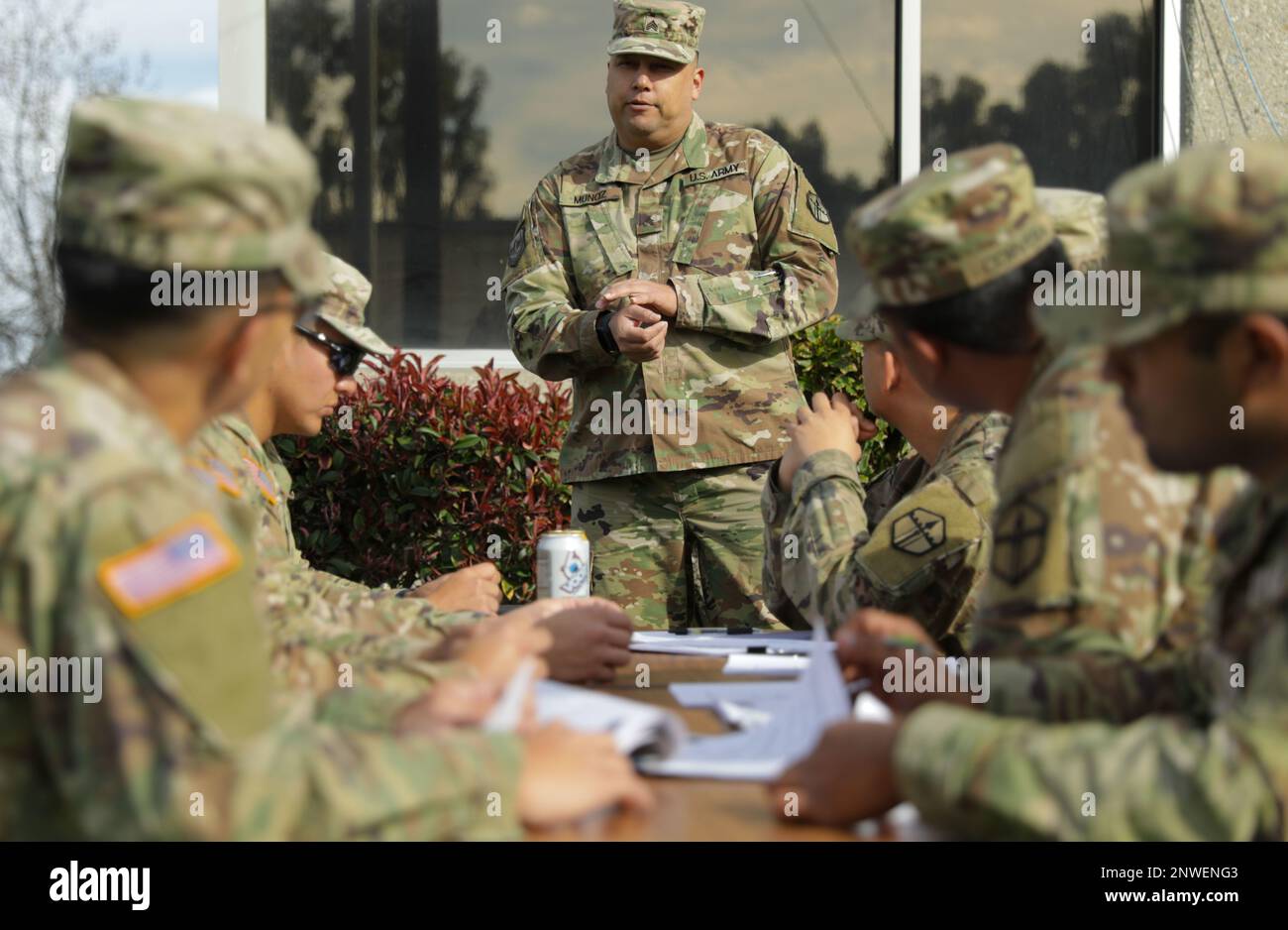 Soldiers with the 394th Engineering Company, attend an outdoor ...