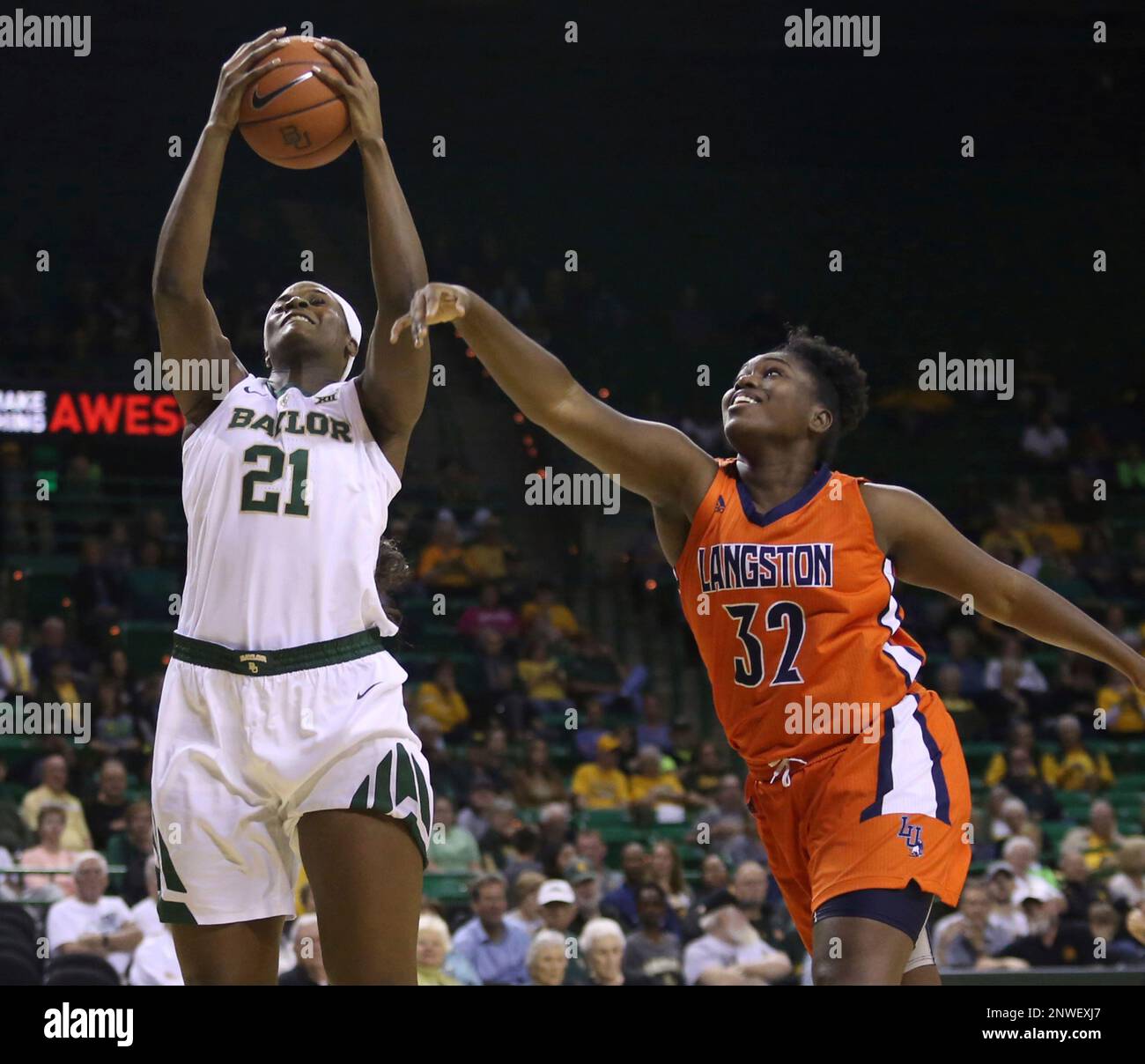 Baylor center Kalani Brown (21) grabs the loose ball from Langston's ...