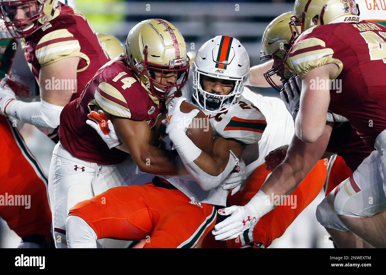 Boston College linebacker Max Richardson (14) tackles Miami running ...