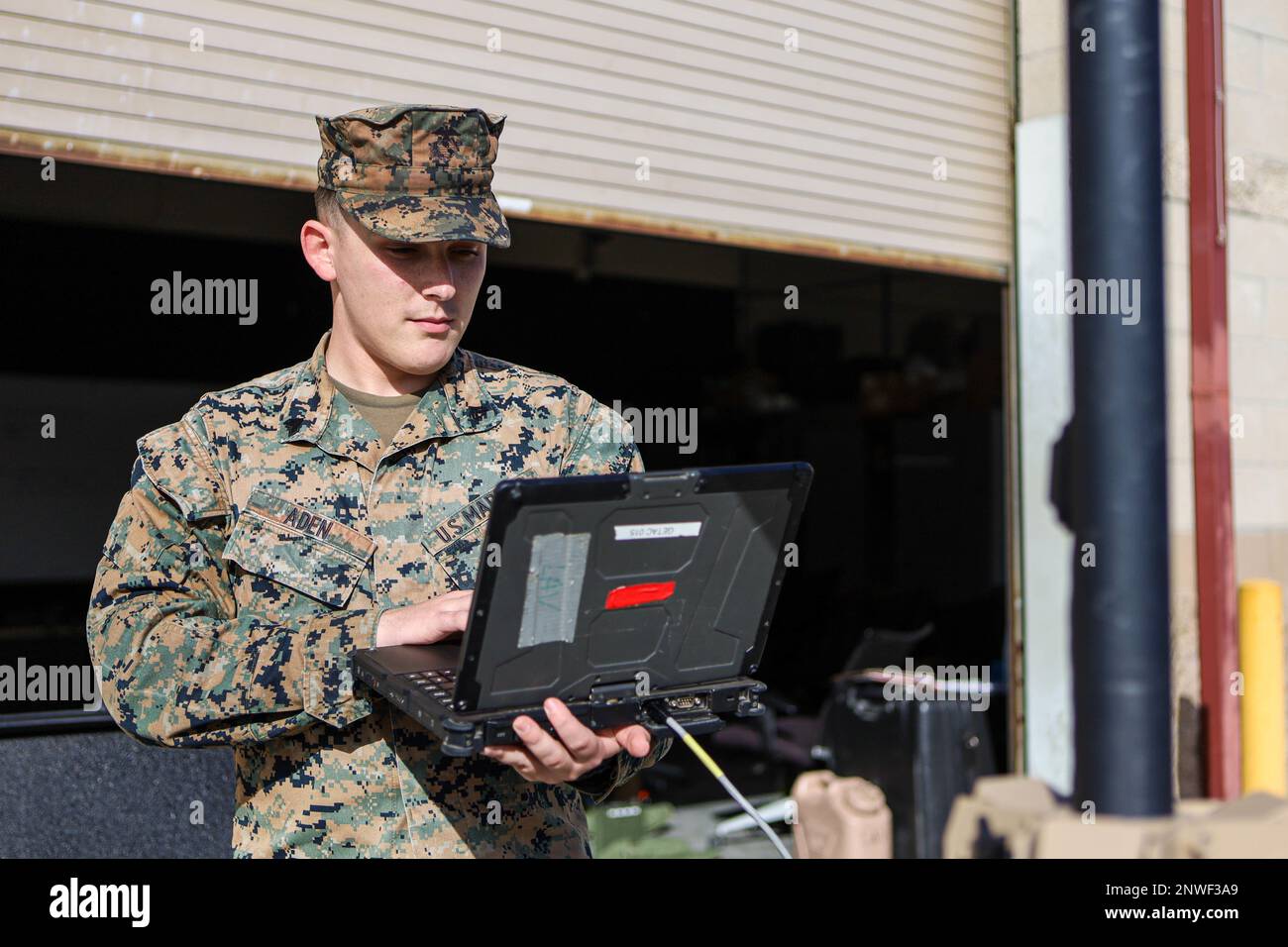 U.S. Marine Corps Cpl. Jonathan Aden, a special communications signals ...