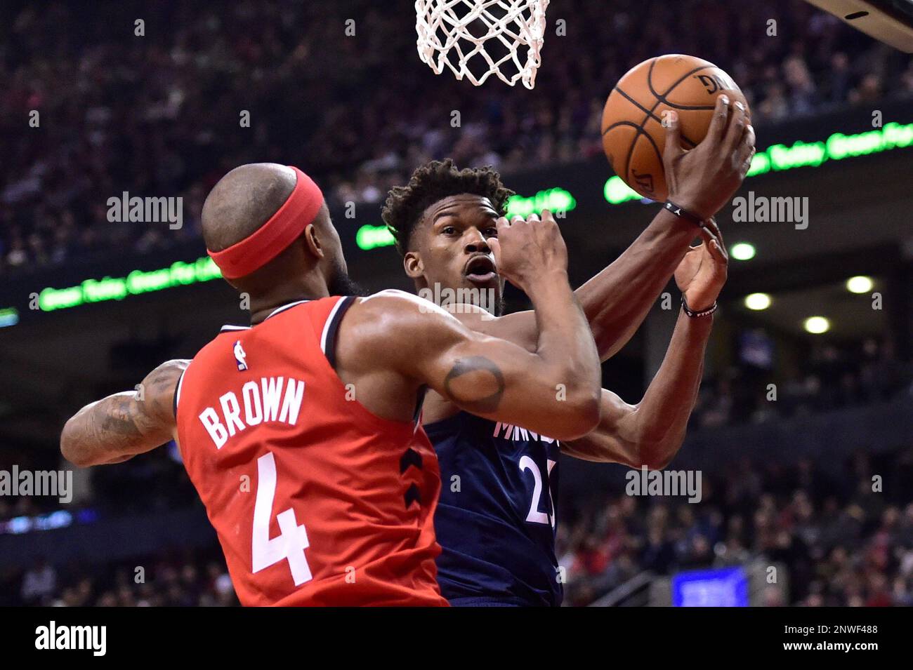 Minnesota Timberwolves guard Jimmy Butler (23) drives to the net as ...
