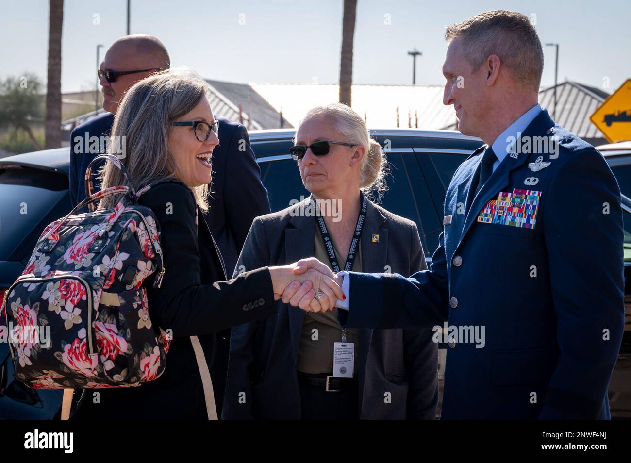 Arizona Governor Katie Hobbs shakes hands with Brig. Gen. Jason ...