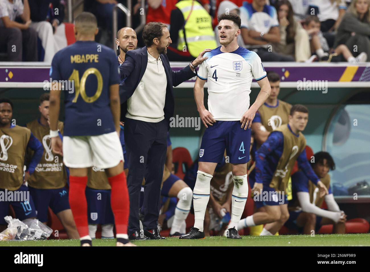 AL KHOR - (LR) England coach Gareth Southgate, Declan Rice of England ...