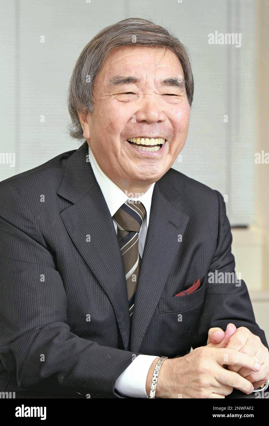 Renowned Japanese fashion designer Jun Ashida speaks during an ...