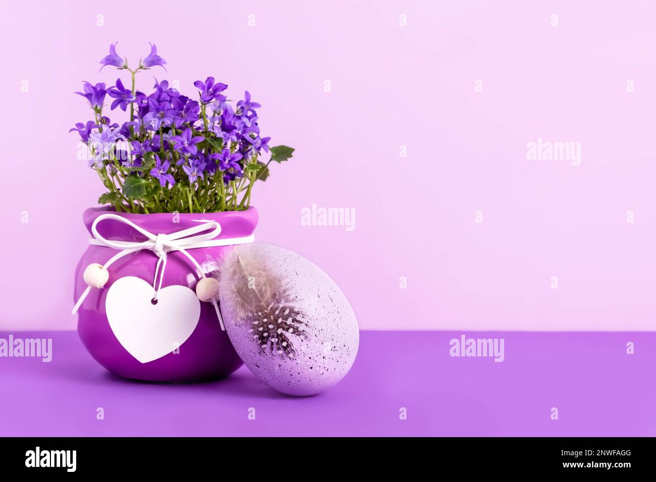 Purple easter background with minimal composition of Easter egg and ...