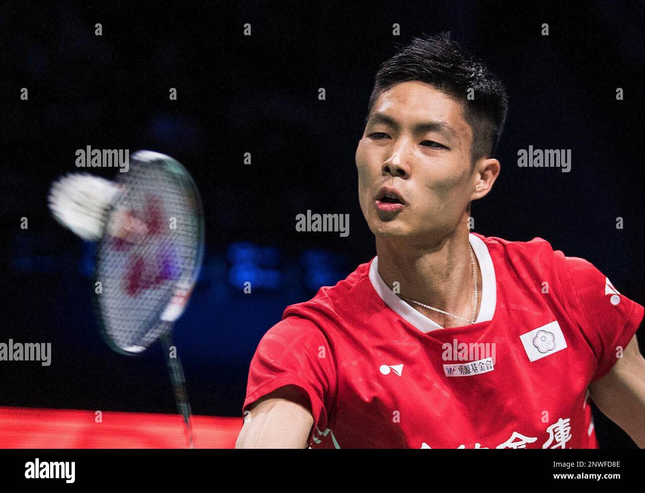 Chou Tien Chen of Chinese Taipei in action against Kento Momota of ...