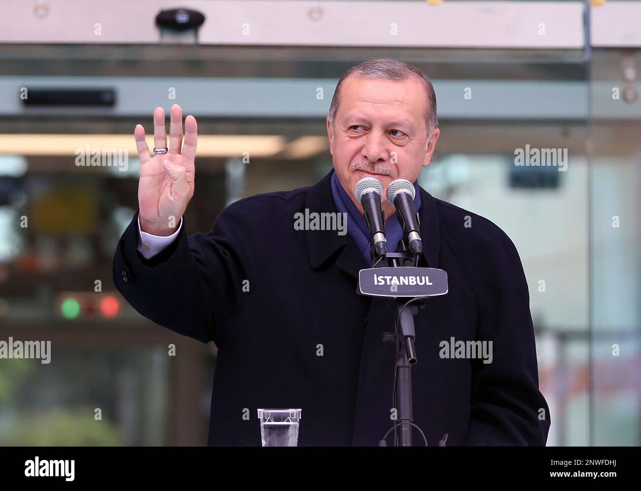 Turkish President Recep Tayyip Erdogan, waves following his speech at ...
