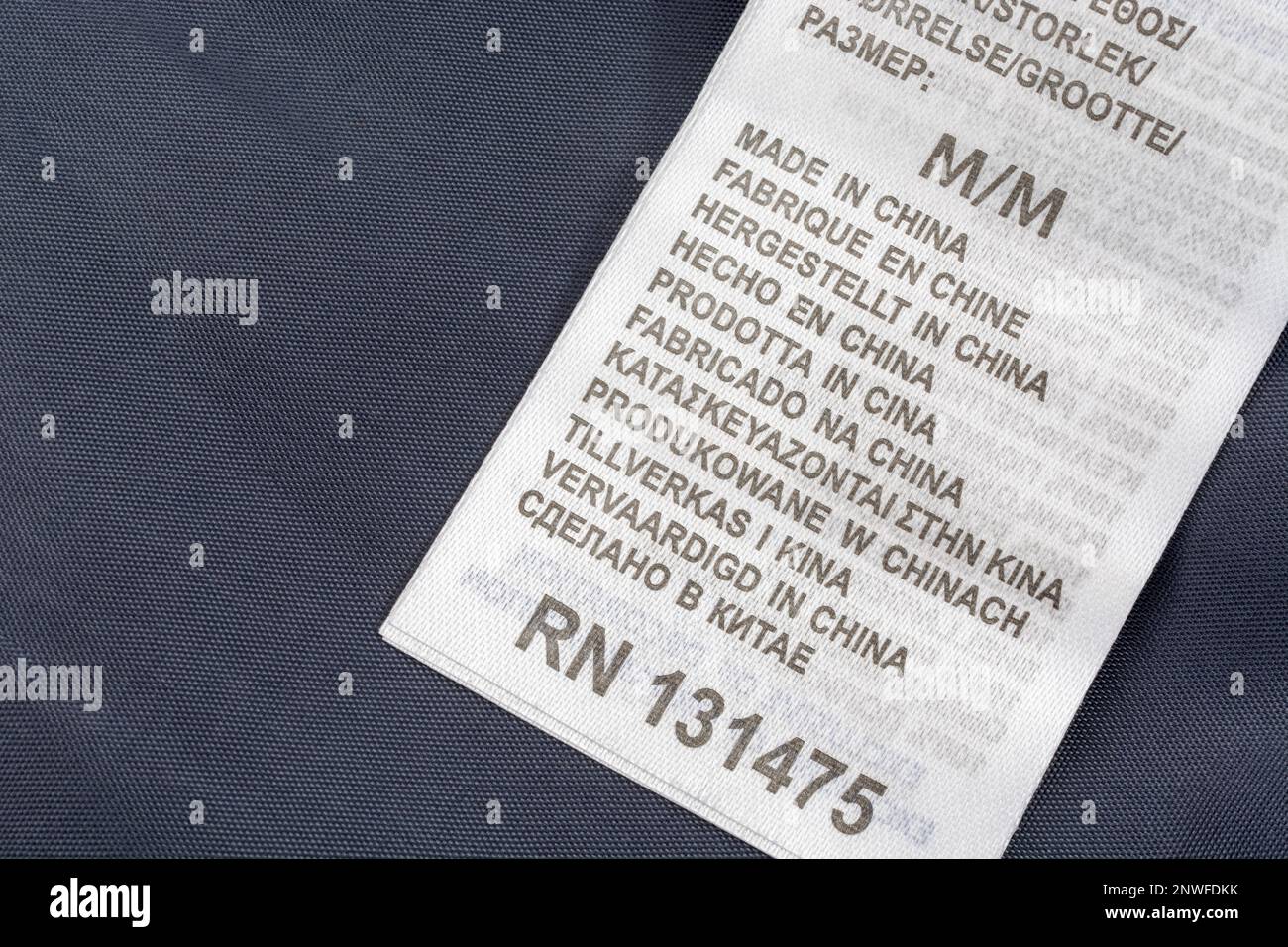 Made in China garment label in multiple languages. For Chinese textile ...