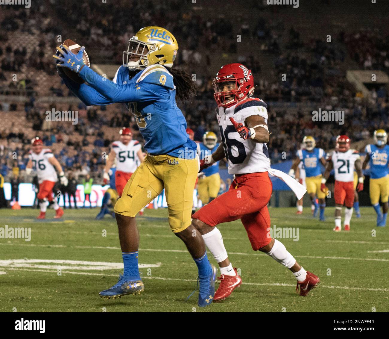 PASADENA, CA - OCTOBER 20: UCLA defensive back Elijah Gates, left ...