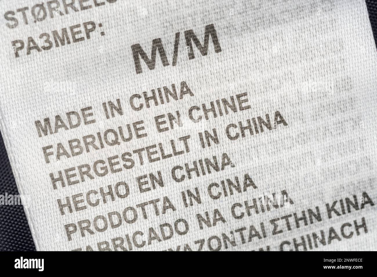 Made in China garment label in multiple languages. For Chinese textile ...