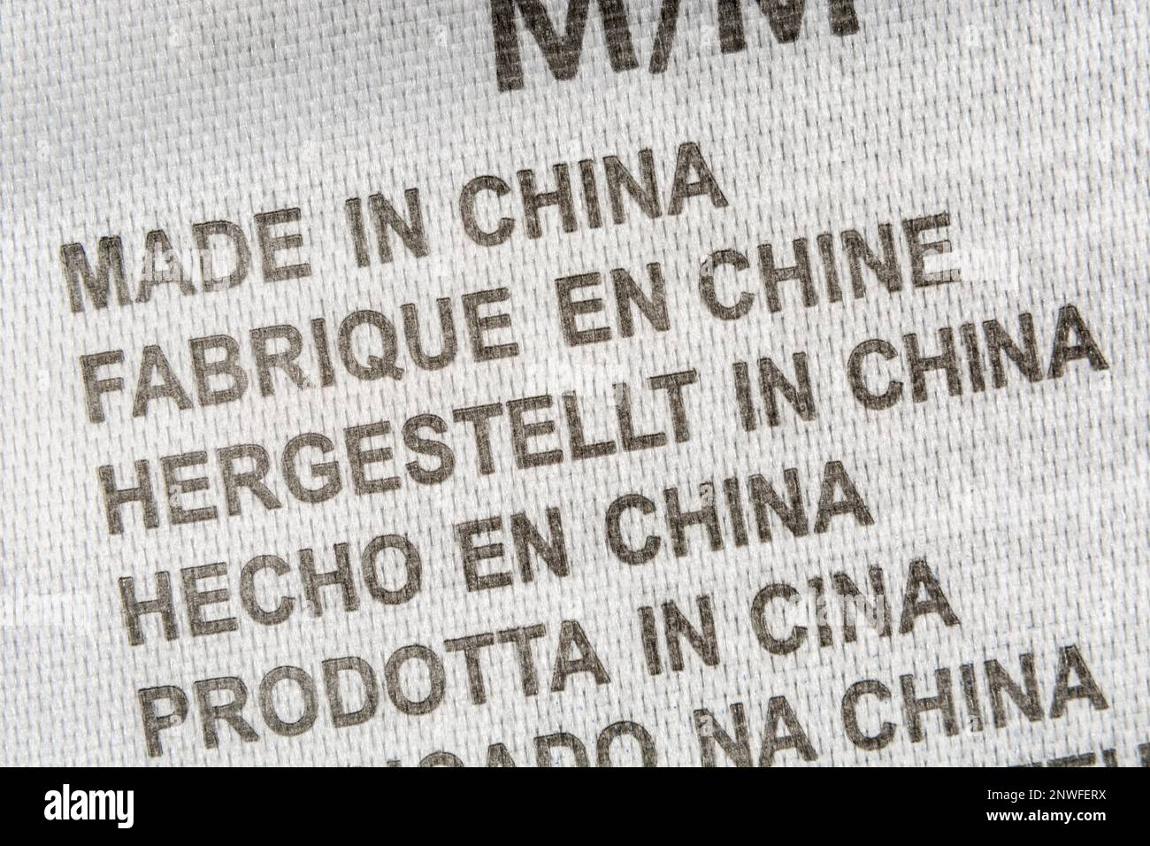 Made in China garment label in multiple languages. For Chinese textile ...