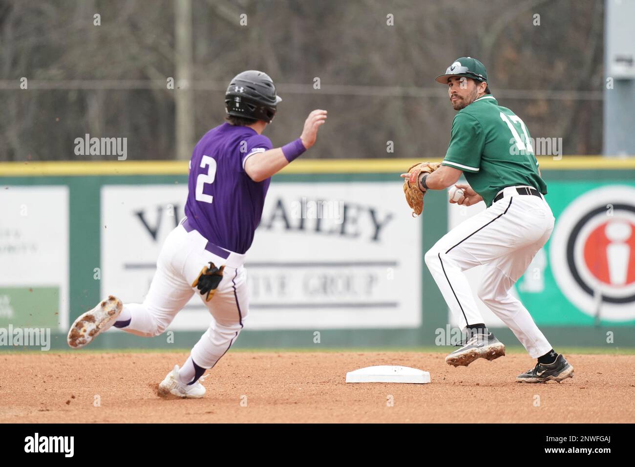 USC Upstate infielder Noah Rabon (17) turns a double play against ...