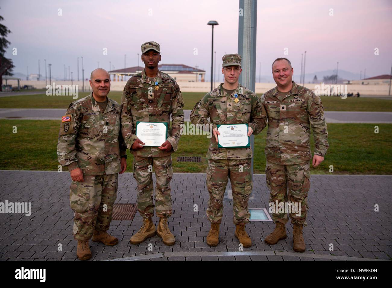 Spc. N Vafing Kamara and U.S. Army Sgt. Jared J. Ihry are awarded the ...