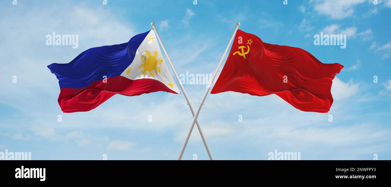 two crossed flags ussr and Philippines waving in wind at cloudy sky ...