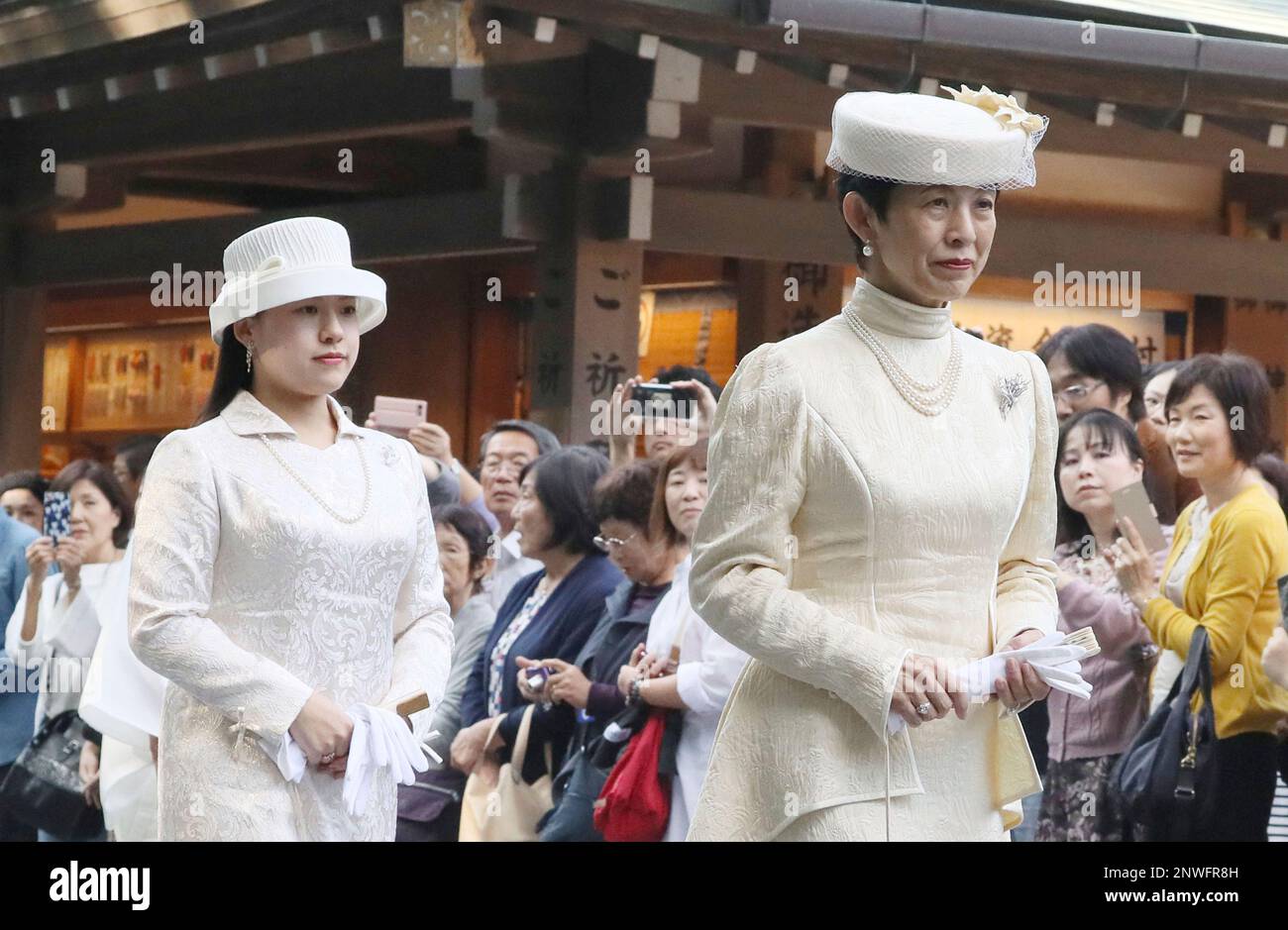 Japan's Princess Ayako (L), the third daughter of the late Prince ...