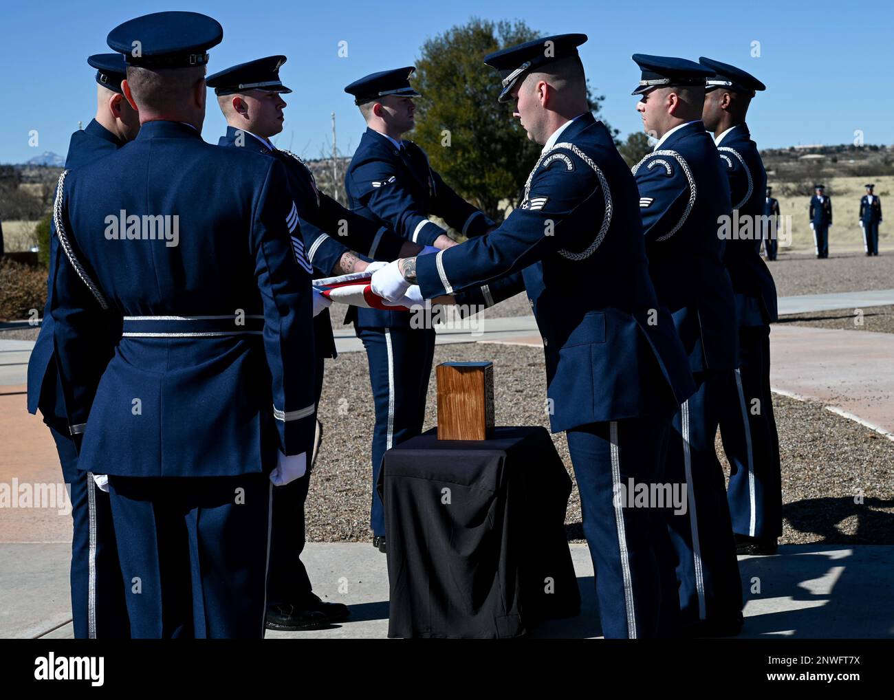 Members of the U.S. Air Force Honor Guard fold the American flag during ...