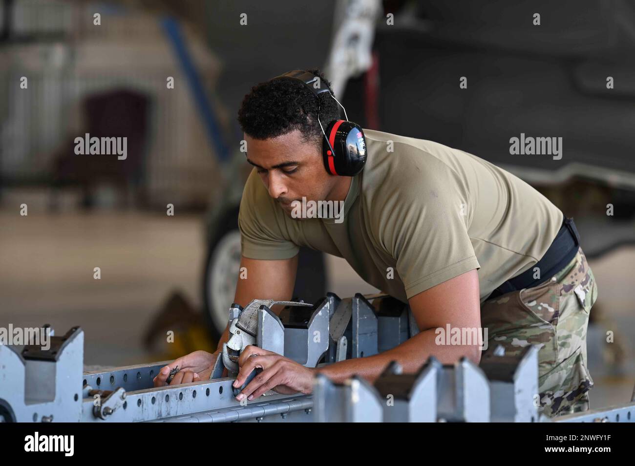 U.S. Air Force Staff Sgt. Michael Ridgeway, a weapons load crew chief ...