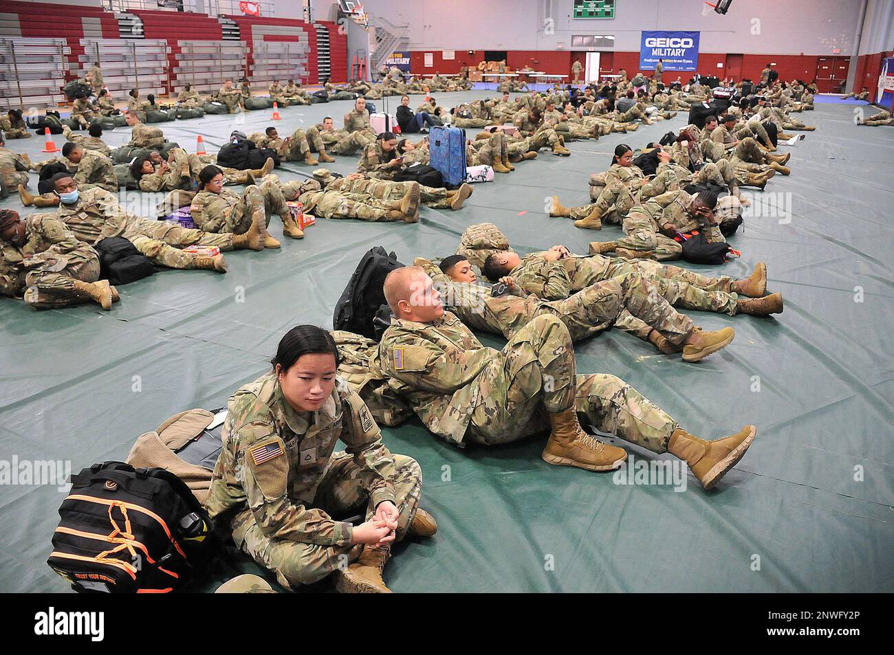 Advanced Individual Training students await buses that will return them ...