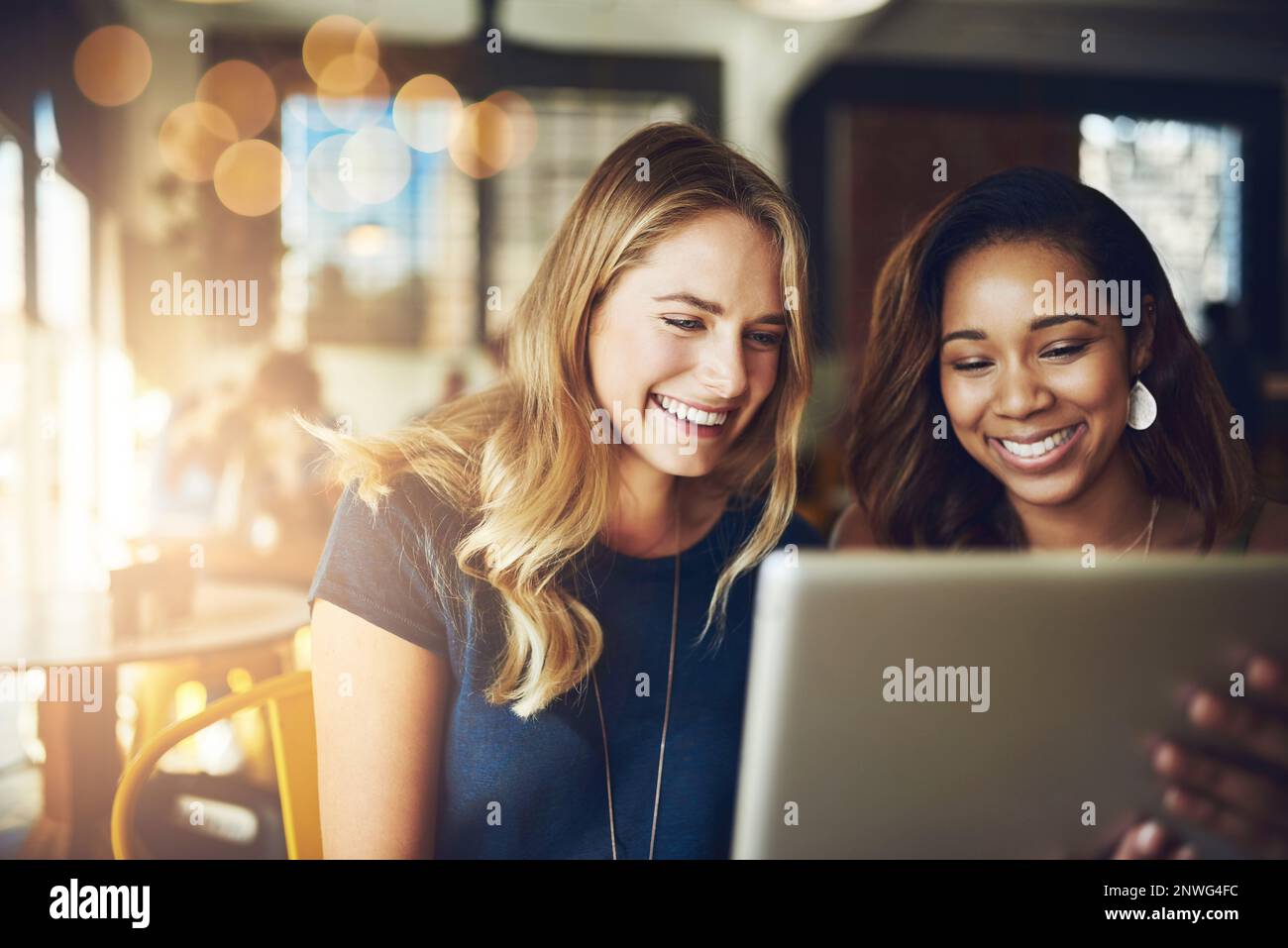 Five star rating for a five star cafe. Cropped shot of girlfriends ...