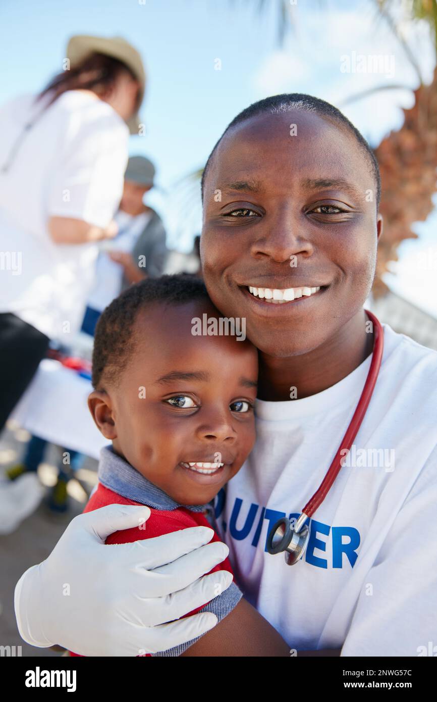 Volunteering for the love of kids. Portrait of a caring volunteer ...