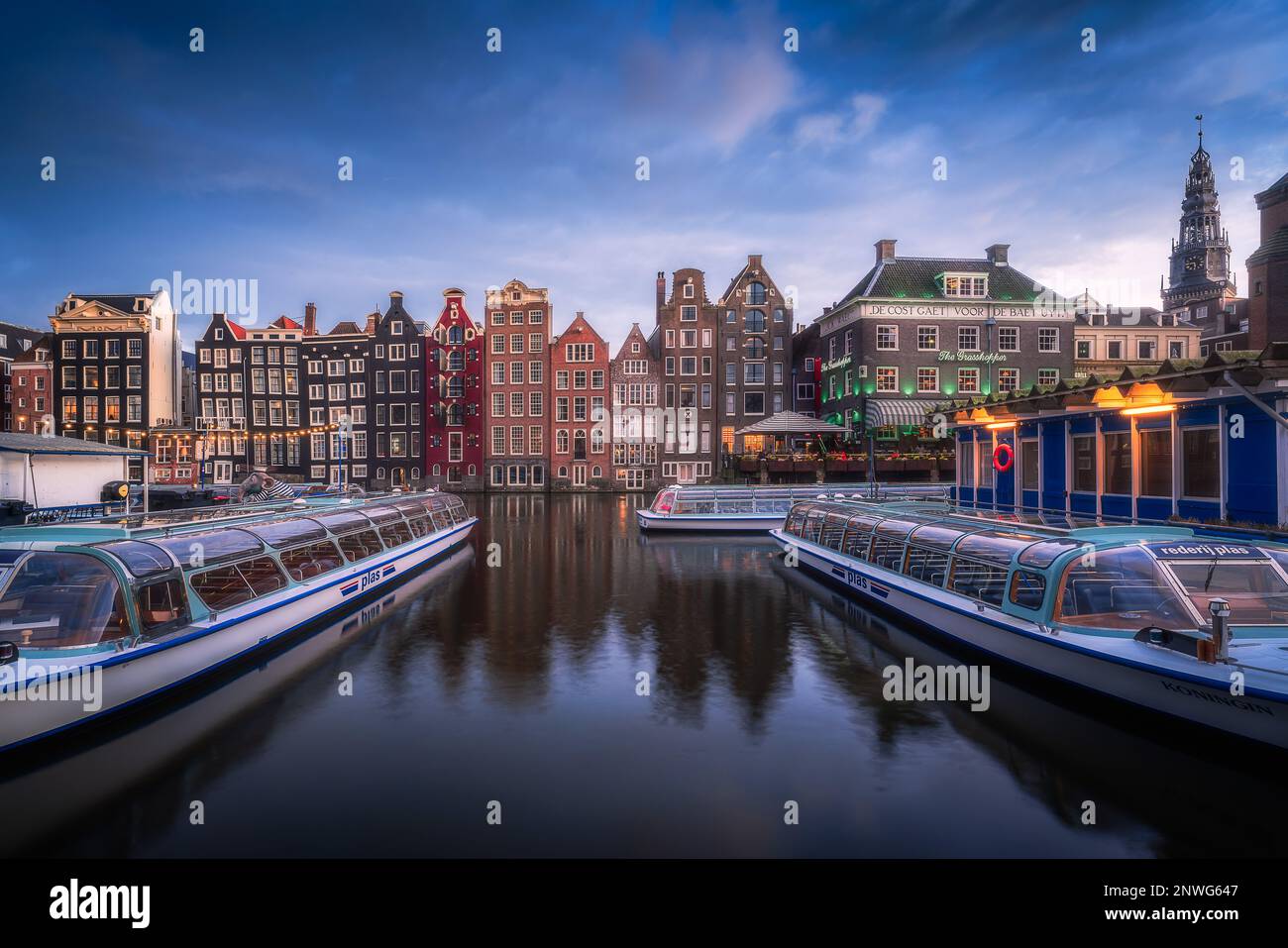 Sunset view of the famous historic center with lights, bridges, canals ...