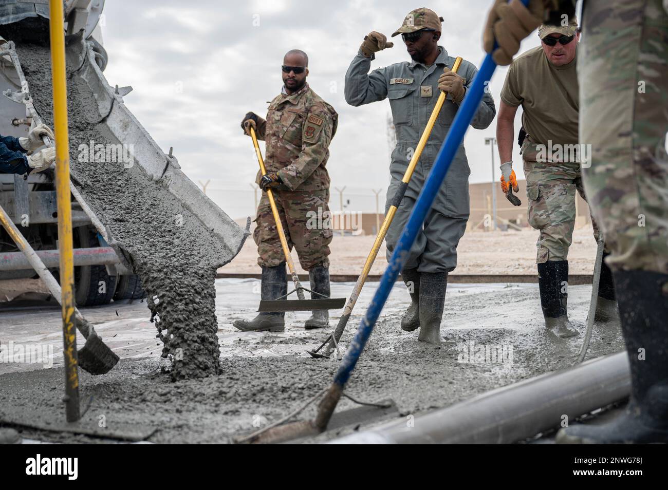 379th Expeditionary Civil Engineer Squadron Airmen lay concrete at the ...