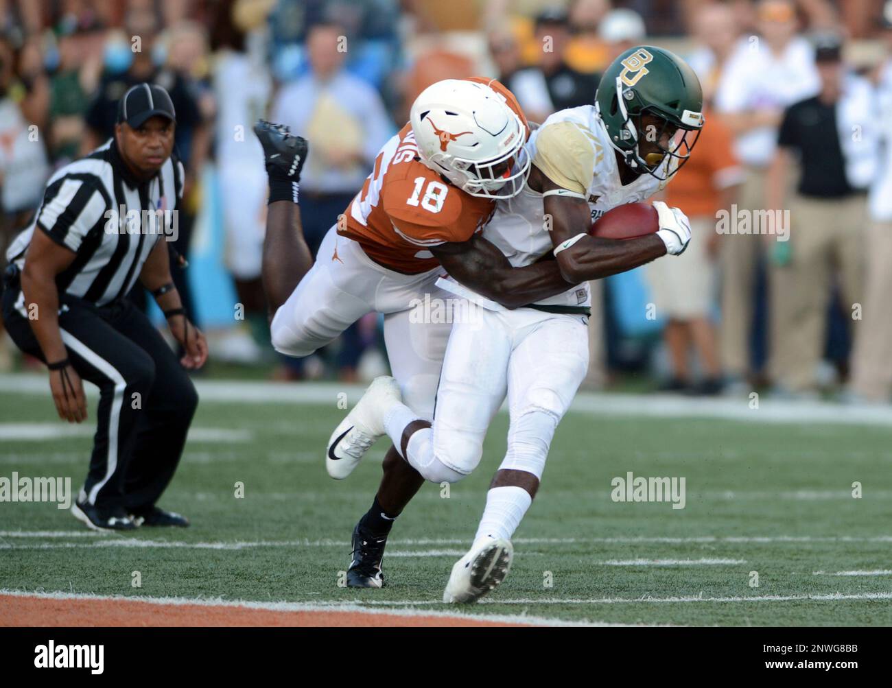 AUSTIN, TX - OCTOBER 13: Baylor Bears WR Denzel Mims is tackled by ...
