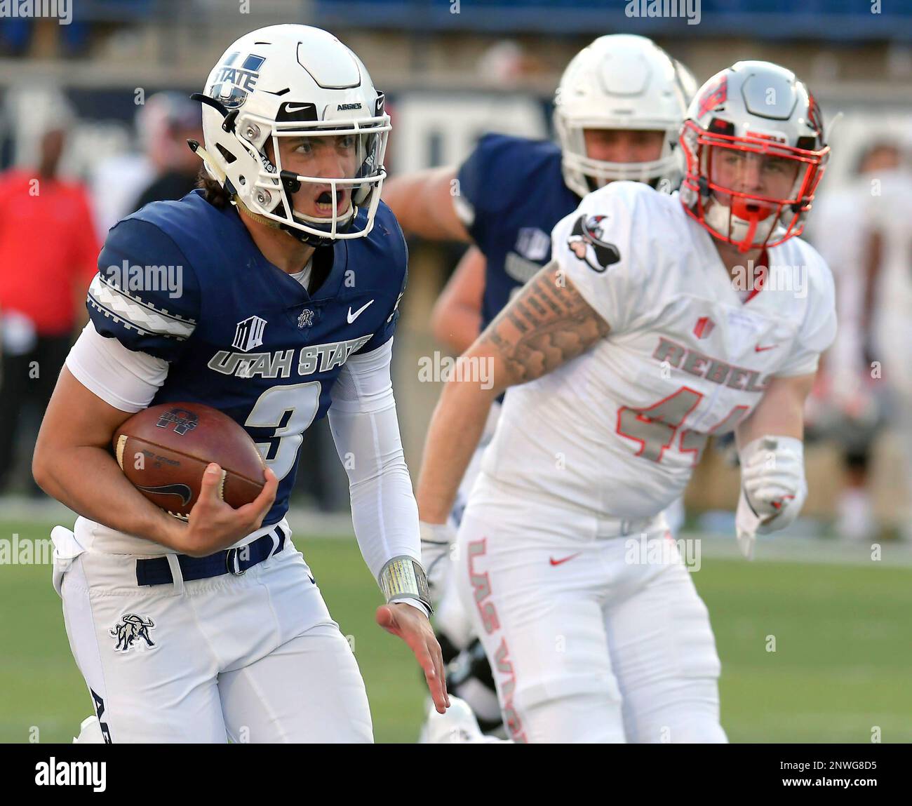 Utah State quarterback Henry Colombi (3) runs down the field for a 37 yard touchdown as UNLV ...