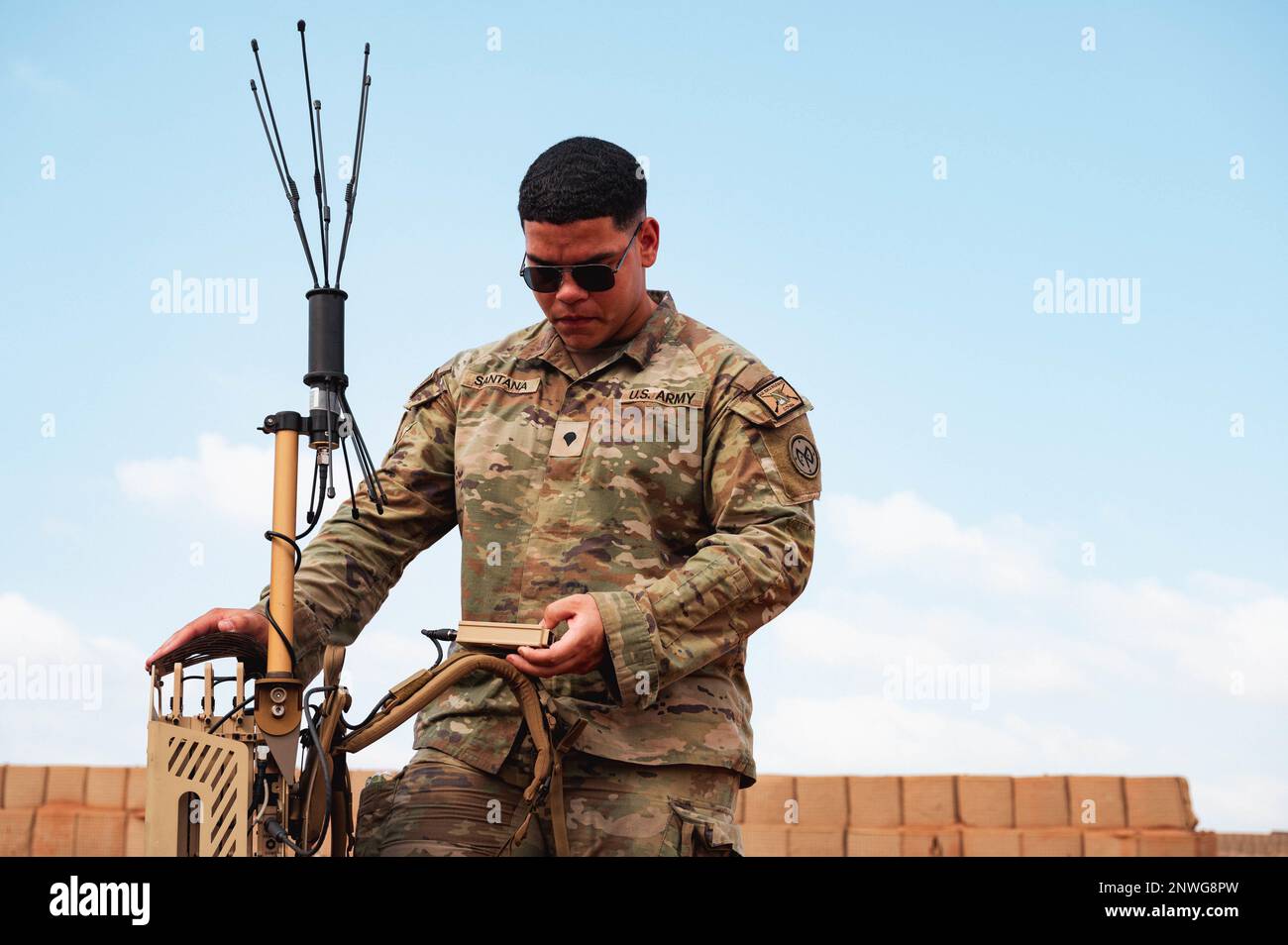 A U.S. Army soldier handles equipment during an electronic warfare ...