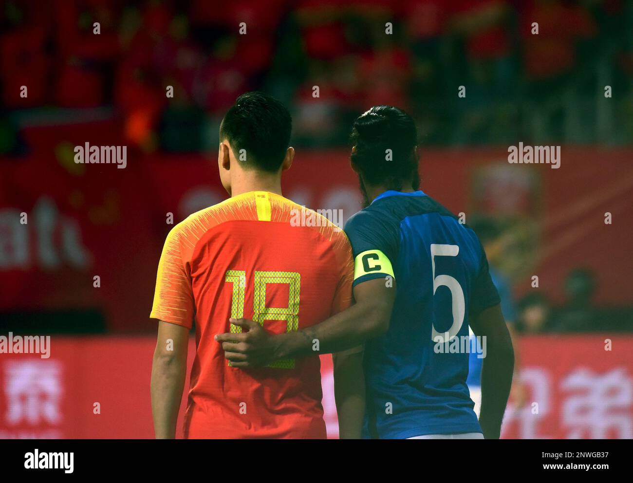 Sandesh Jhingan of India, right, and Gao Lin of China, left, pose for ...