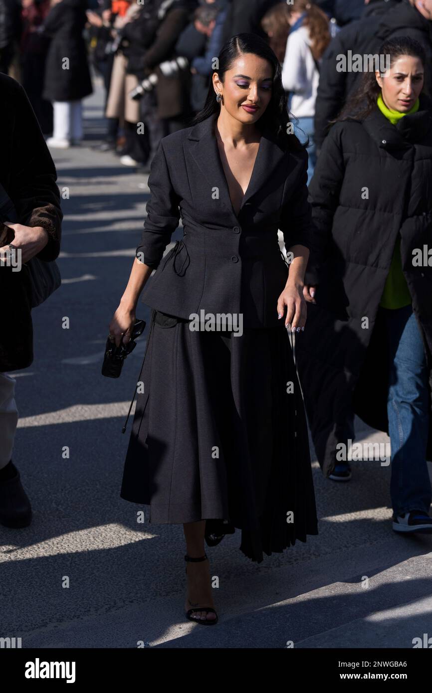Amina Muaddi poses for photographers upon arrival at the Christian Dior Fall/Winter 2023-2024 ...