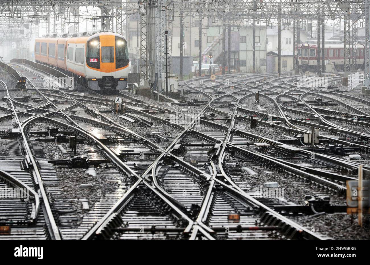 Trains pass on railroad making geometric patterns near Yamato Saidaiji ...