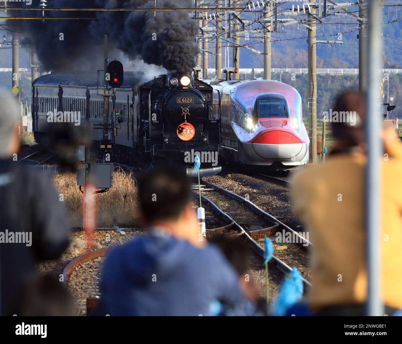Steam locomotive Class C61 and Akita Shinkansen Komachi bullet train ...