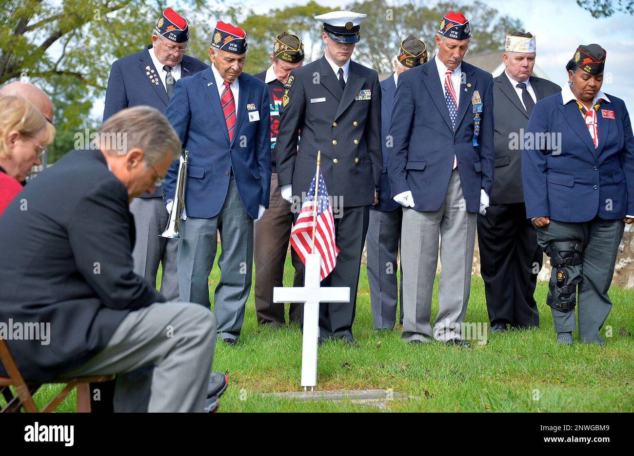 Tom Wibberley, seated far left, father of U.S. Navy Seaman Craig ...