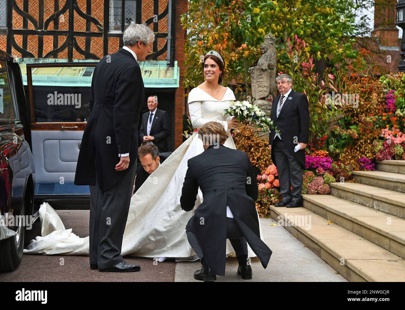 Britain's Princess Eugenie arrives with her father Prince Andrew for ...