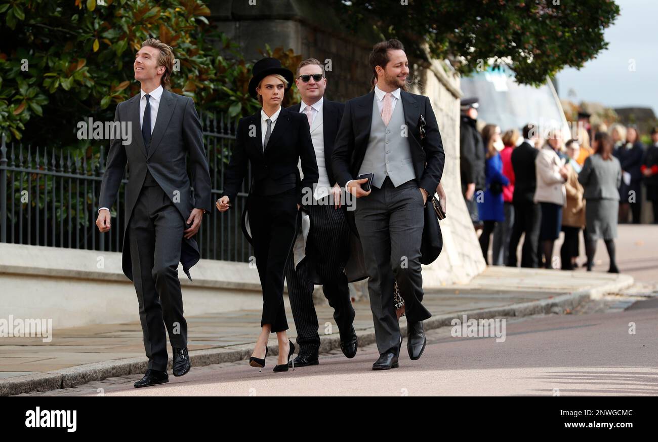 British model Cara Delevingne, second from left, arrives for the ...