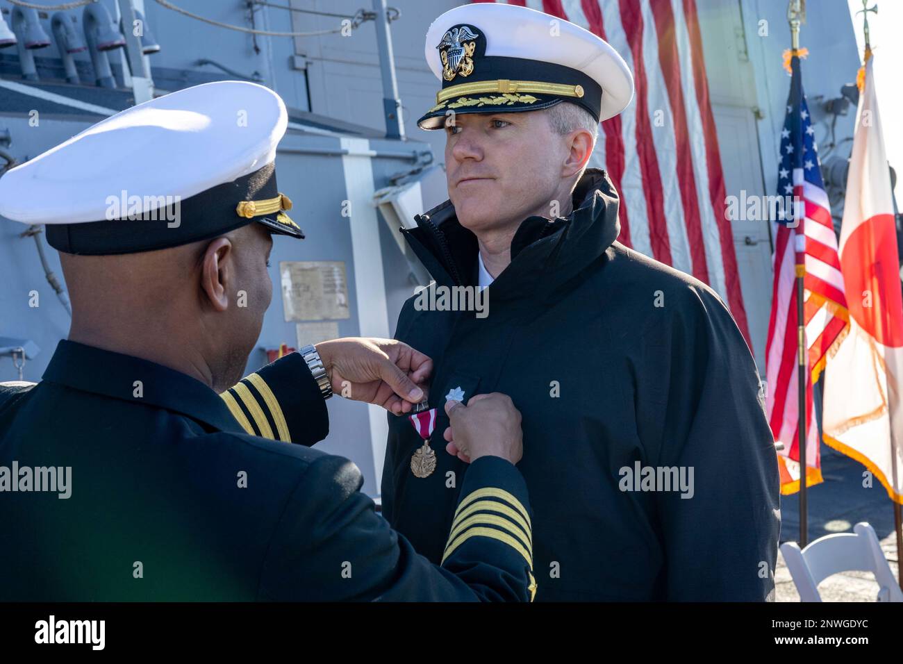TOKYO BAY, Japan (Jan. 26, 2023) Capt. Walt Mainor, left, Commodore of ...