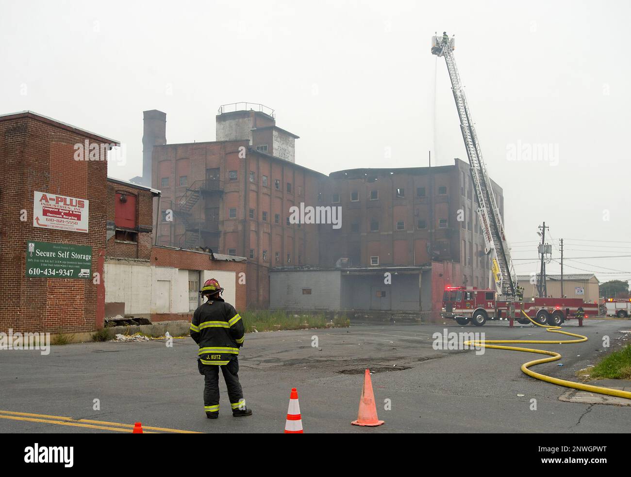 Firefighters continue to work on the scene Monday, Oct. 8, 2018, hours ...