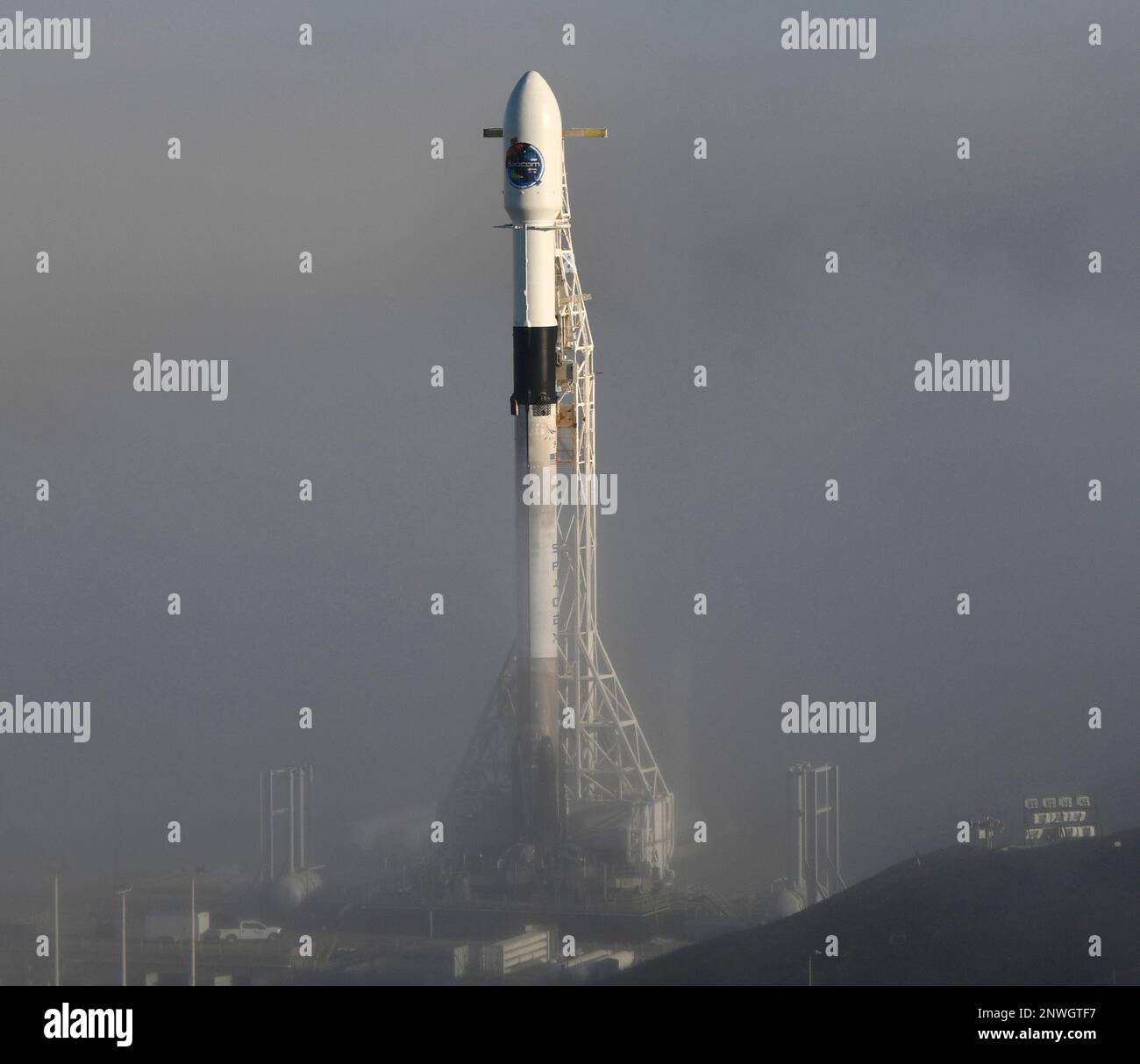 10-7-18. Vandenberg AFB. CA. SpaceX F-9 emerges from the thick fog as ...