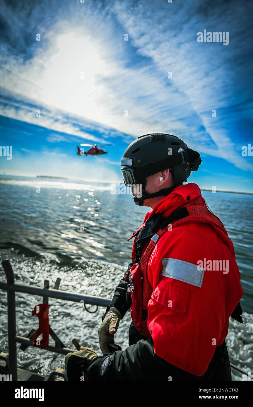 U.S. Coast Guard Boatswains Mate 3rd Class Ronald Bell, a boat crew ...