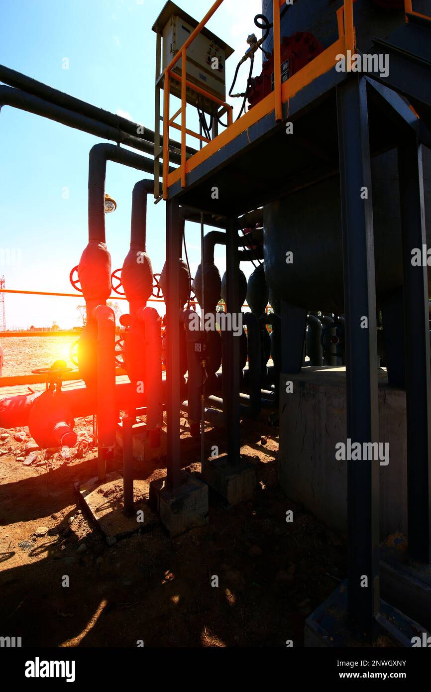 Oil pipes and valves Stock Photo - Alamy